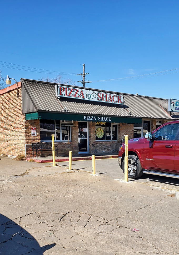 Under that metal roof and simple sign lies pizza perfection that locals have treasured for generations. Proof that greatness doesn't need fancy packaging.