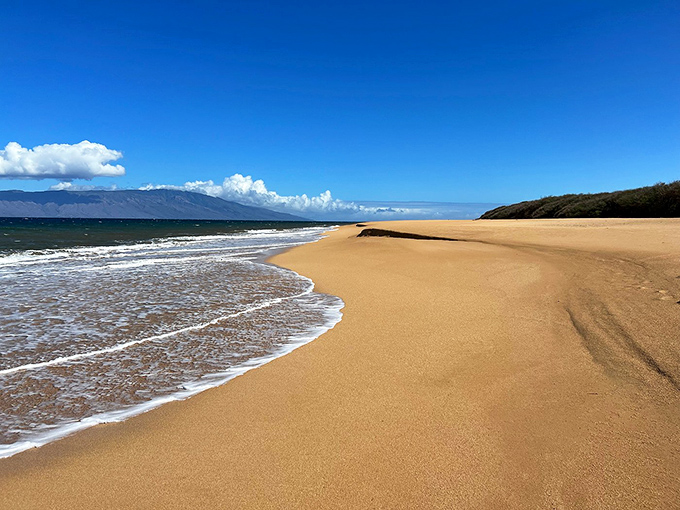Miles of untouched shoreline at Polihua Beach stretch toward the horizon. This is social distancing, Hawaiian style&mdash;before it was even a thing.