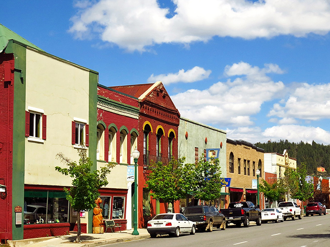 The vibrant storefronts of Quincy pop against mountain backdrops, like nature decided to frame a perfect small town.