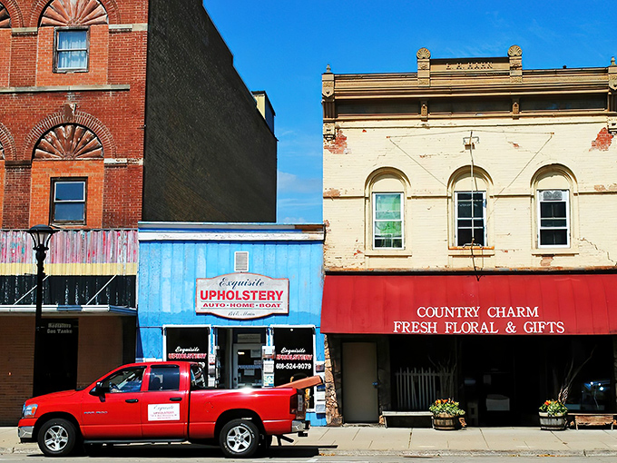 A bright blue upholstery shop neighbors "Country Charm" in downtown Reedsburg&mdash;even the business names here feel like a warm Midwestern hug.