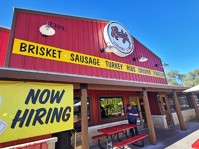That yellow banner listing "brisket, sausage, turkey, ribs, chicken" reads like a carnivore's dream grocery list.