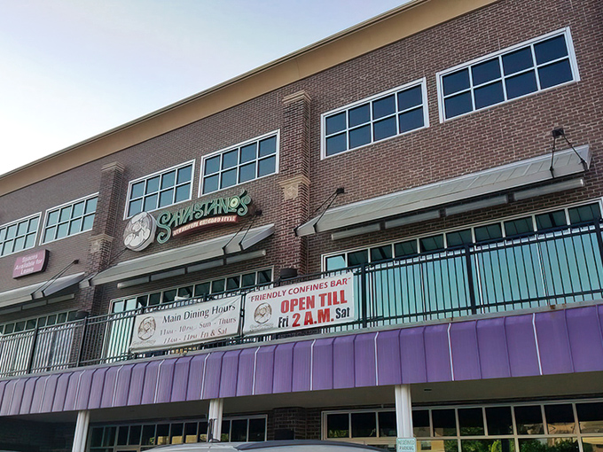 The violet awning beckons like a pizza runway, guiding hungry patrons to Chicago-style heaven in the heart of Oklahoma.