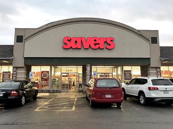 As dusk embraces Overland Park, Savers' crimson sign glows like a Broadway marquee&mdash;Tuesday's senior discount awaits behind those illuminated doors!