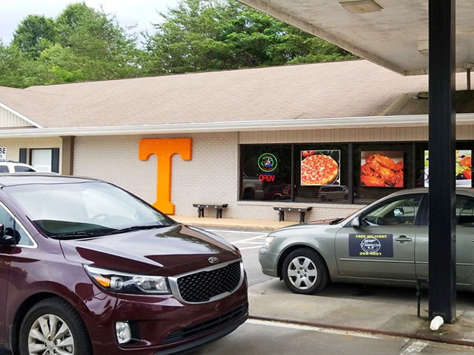 A shrine to the Volunteer State and great pizza! Tennessee Pizza Company's storefront proudly displays its local roots with that unmistakable orange "T".