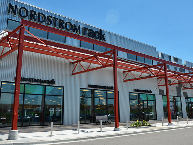 The Mayfair Collection: Those industrial red beams aren't just architectural flair&mdash;they're pointing you toward fashion finds worth bragging about.