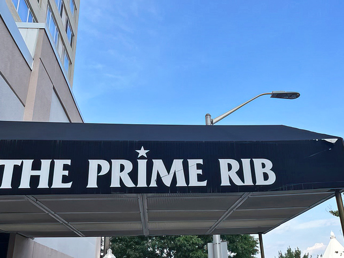 The sleek black awning marks the spot where old-school elegance and perfectly aged beef create pure magic.