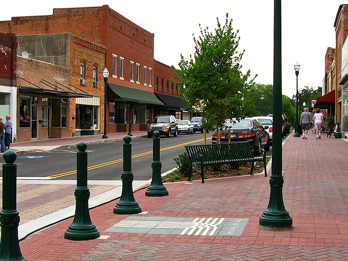 The brick buildings of downtown Toccoa stand like friendly sentinels, guarding generations of small-town stories and secrets.
