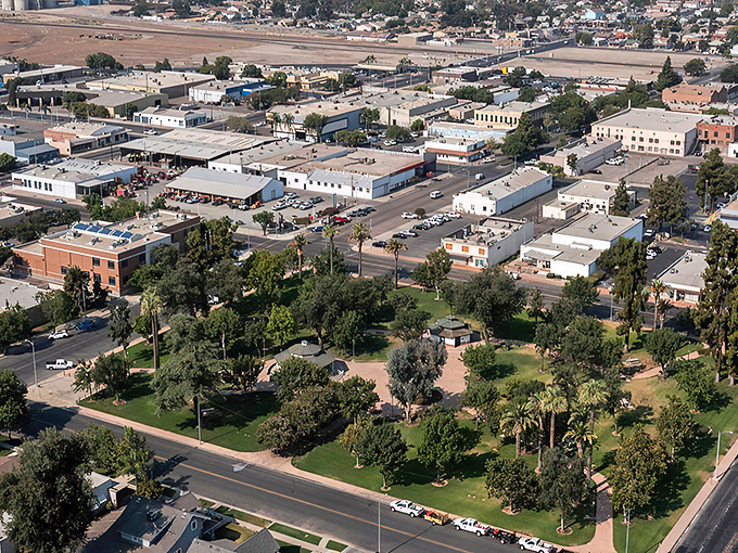 Tulare's aerial view reveals a patchwork of neighborhoods where retirement dreams don't require a fortune. Room to breathe and savings to keep!