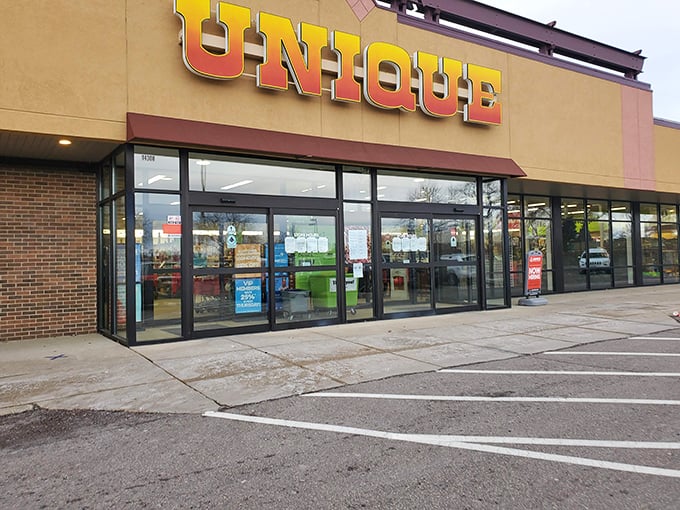 Morning light catches Unique's storefront, promising a day of discoveries. Every thrifter knows the early bird catches the vintage vinyl.