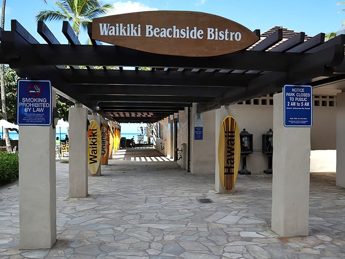 Surf's up at the entrance to flavor town! Waikiki Beachside Bistro's colorful surfboard welcome mat says "leave your shoes&mdash;and your worries&mdash;at the door."