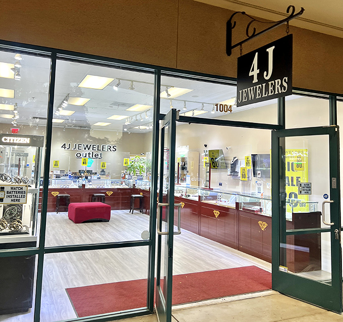 At 4J Jewelers, sparkly temptations await behind glass cases, while that red ottoman strategically invites you to sit and contemplate "investment pieces."