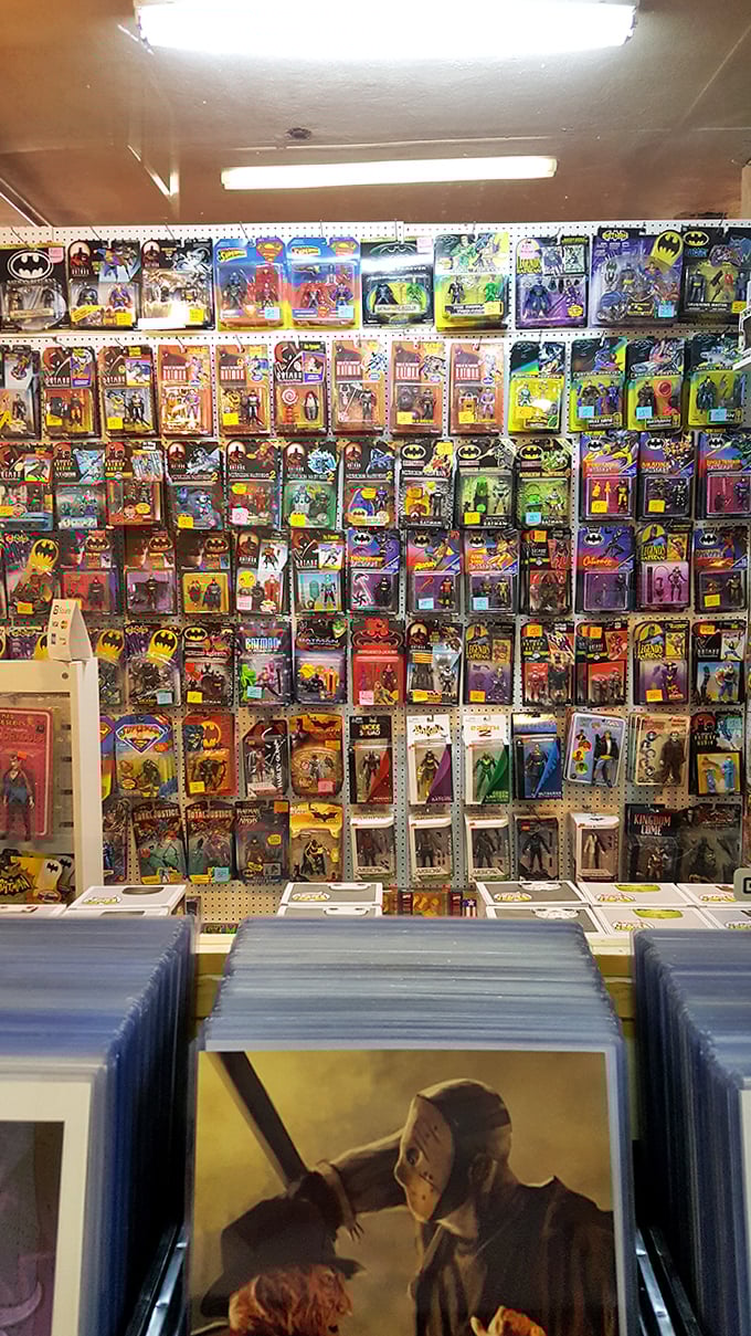 Holy collectibles, Batman! This action figure wall is like a time capsule of childhood dreams, preserved in plastic for nostalgic adults.