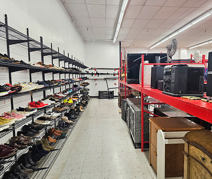 Organized shelves of shoes and electronics prove that thrift shopping doesn't have to mean digging through chaos.