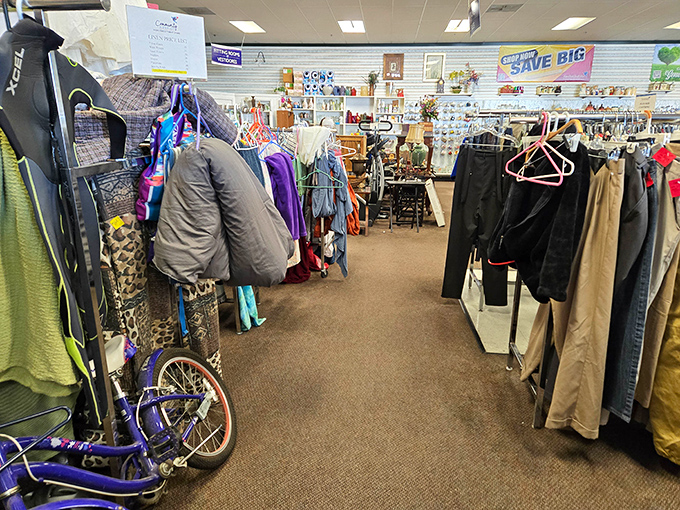 Racks upon racks of possibility. Each hanger holds not just clothing, but potential new identities waiting to be discovered.