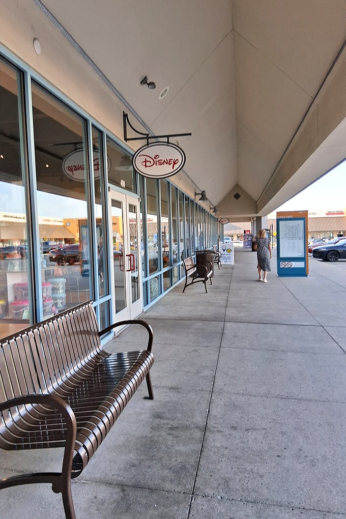 The covered walkways at Tanger offer blessed shade for weary shoppers, with strategically placed benches for those "just one more store" negotiations.