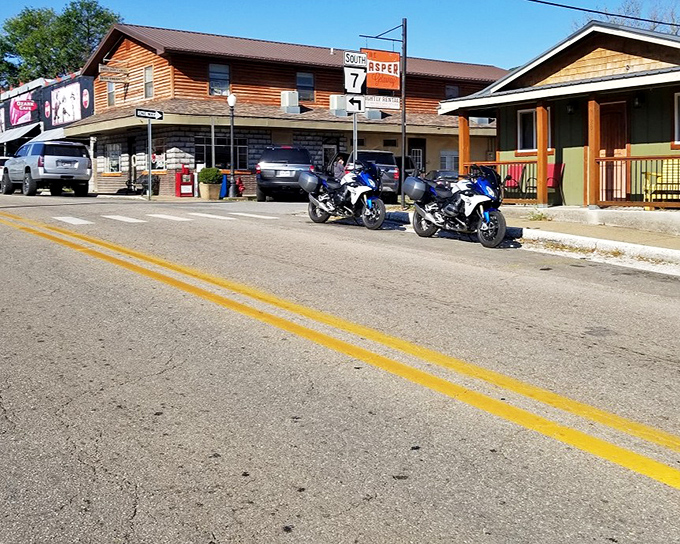 Highway 7 cuts through downtown like a scenic ribbon, bringing motorcyclists who've heard the legends about these curves.