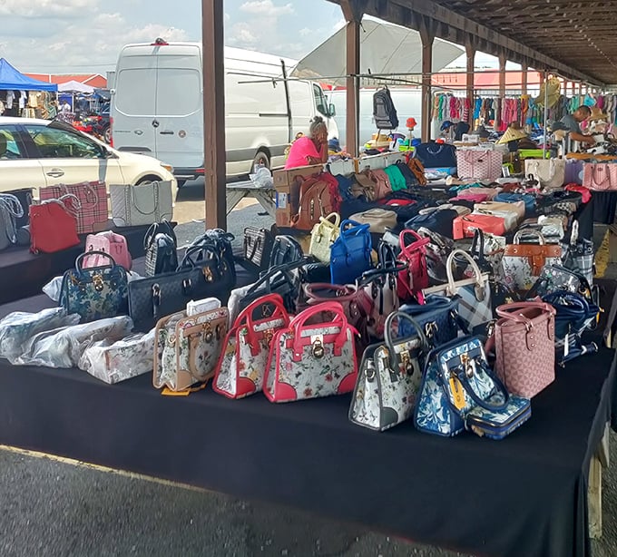 Handbag heaven! More designer-inspired options than a fashionista's dream closet, arranged with the chaotic precision only flea market veterans master.