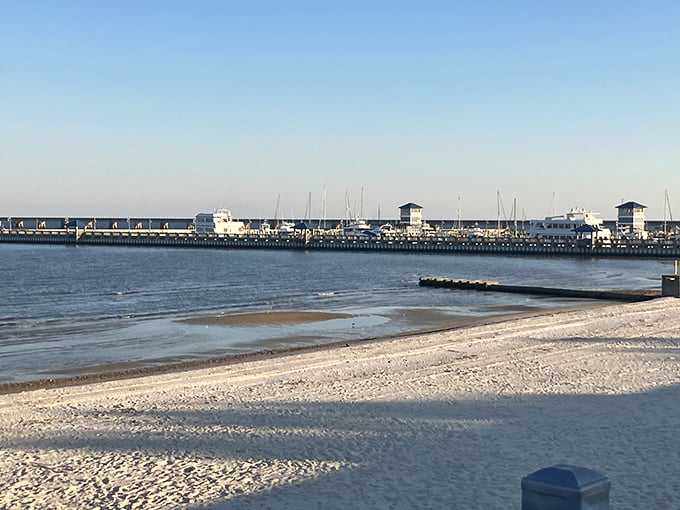 White sand meets gentle waves at the Bay St. Louis beach. The kind of shoreline that makes you wonder why people crowd Miami.