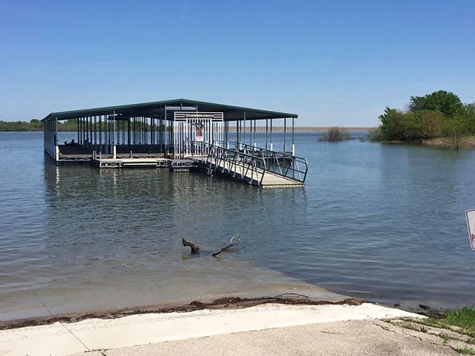 That covered dock isn't just functional, it's where fishing dreams and tall tales are born daily.