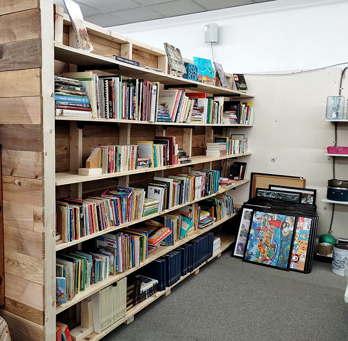 Literary treasures line rustic wooden shelves, each book a doorway to adventure that costs less than a fancy coffee.