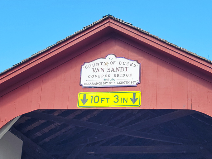The bridge's "driver's license" proudly displays its vital stats&mdash;built 1875, clearance 10'3", length 86'&mdash;a historical ID badge for this venerable structure.