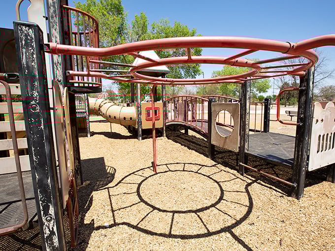 This playground's space-themed equipment isn't just for kids. The circular design might have you wondering if it's sending secret messages to passing UFOs.
