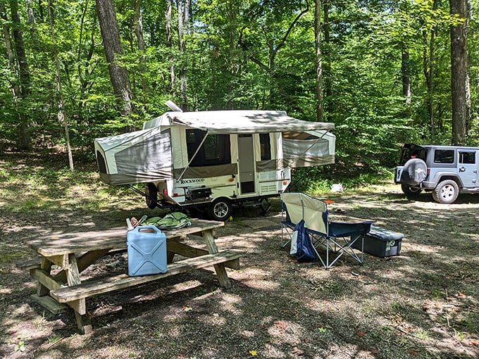 Camping perfection: where your pop-up palace becomes front-row seating to nature's greatest show, no ticket required.