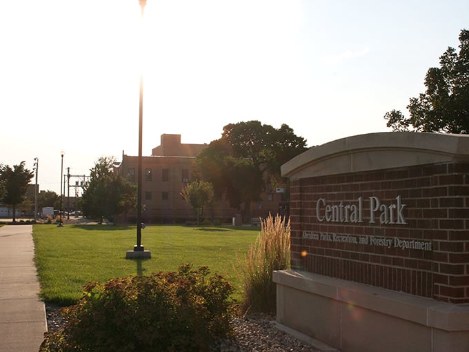 Central Park offers an urban oasis where the prairie breeze carries conversations between neighbors and rustling leaves.