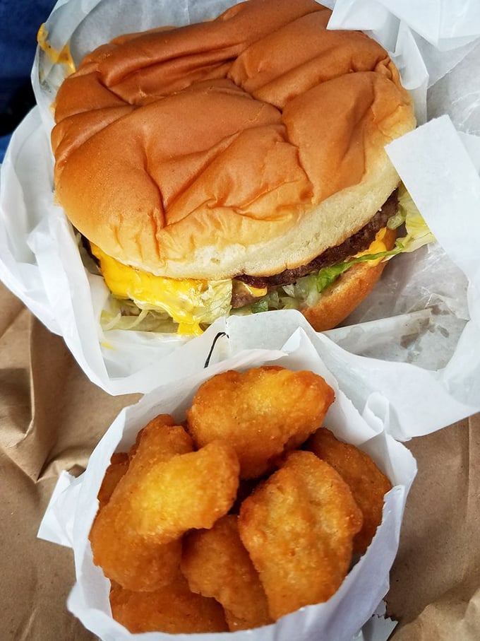 Behold the star of the show: a perfectly constructed cheeseburger alongside golden cheese bites. This isn't Instagram food&mdash;it's actually delicious.
