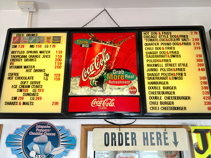 The menu board tells a story of Chicago food traditions, where ketchup remains the unspoken heresy and Vienna Beef reigns supreme.