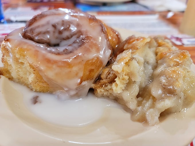 These cinnamon rolls aren't just dessert; they're an edible love letter to your sweet tooth, glistening with icing that melts into every warm, spiced swirl.