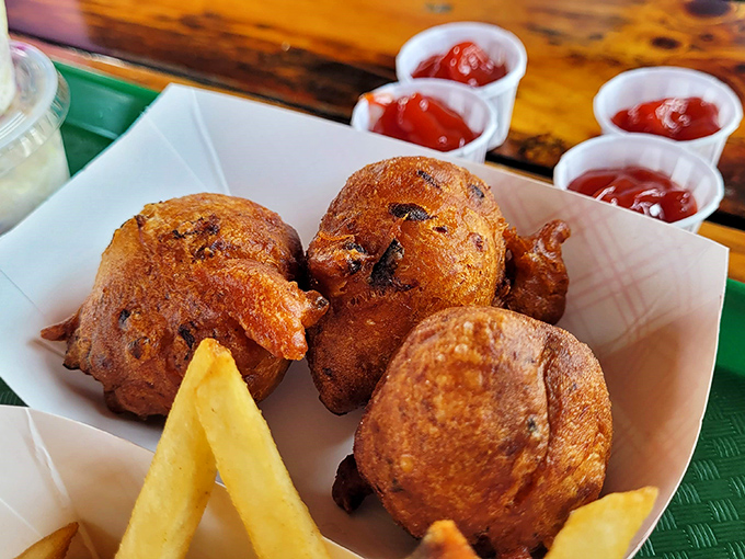 Golden orbs of happiness! These clam fritters aren't just fried dough with a hint of ocean &ndash; they're seafood's answer to donut holes.