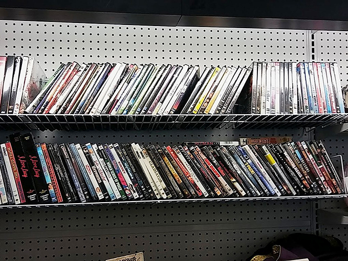 The DVD section: a time capsule of entertainment history where forgotten gems and guilty pleasures await rediscovery.