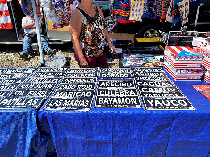These Puerto Rican town signs aren't just decorations&mdash;they're portals to island memories and cultural pride displayed on blue table linen.