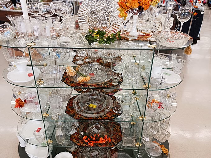Crystal and glassware that once graced celebration tables now wait patiently behind glass, ready for second acts in new homes.