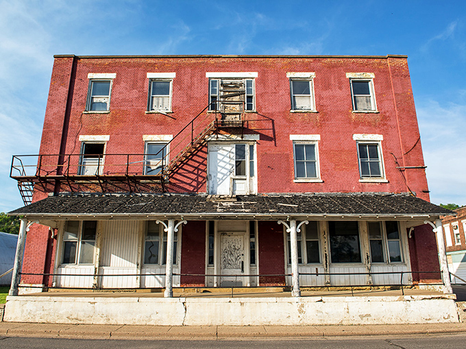 The Denniston House stands as a brick-and-mortar time capsule. Its weathered facade and fire escape tell stories of river commerce and frontier ambition.