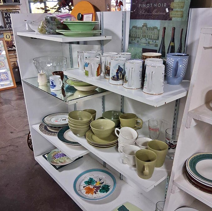 Grandma's kitchen cabinet comes back to life on these shelves, where vintage Pyrex and everyday dishes await their second chance at mealtime glory.