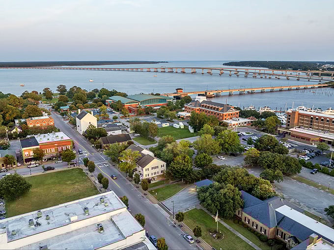 This bird's-eye view showcases New Bern's strategic location where rivers meet, creating a waterfront playground that would make any landlocked visitor green with envy.