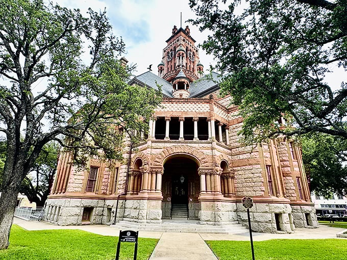 The Ellis County Courthouse isn't just a building&mdash;it's a sandstone symphony of turrets and arches that makes modern government buildings look like they've given up.
