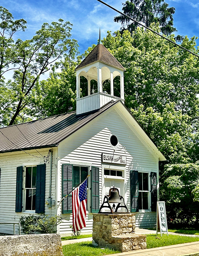 The Elsah Village Hall stands proudly with its bell tower and American flag &ndash; Norman Rockwell couldn't have painted it better. 