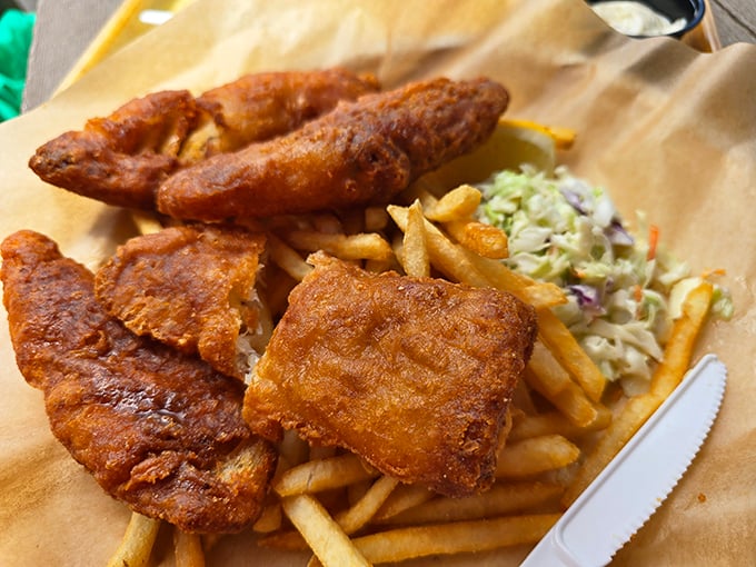 Golden, crispy fish and chips that make a satisfying crunch with each bite. The coleslaw adds that perfect tangy counterpoint to the richness.