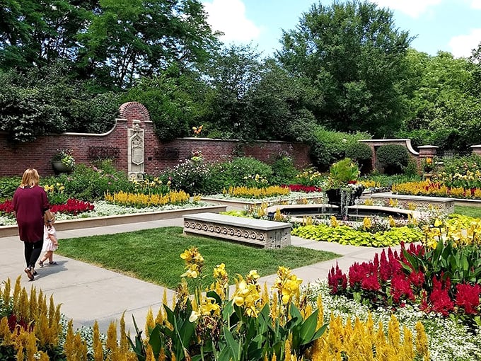 The same brick walls that frame formal blooms could tell stories of countless marriage proposals and family photos.