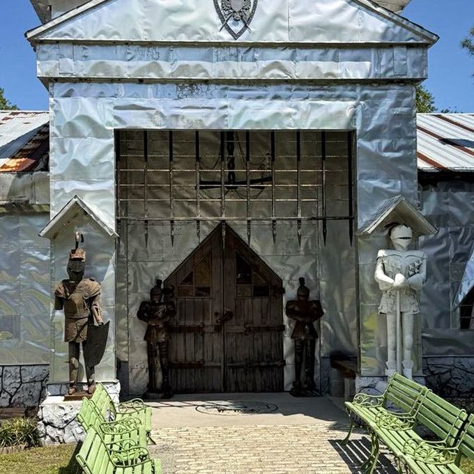 Knights guard the entrance with the stoic determination of bouncers at the world's most eclectic art gallery. The green benches invite you to sit and contemplate.