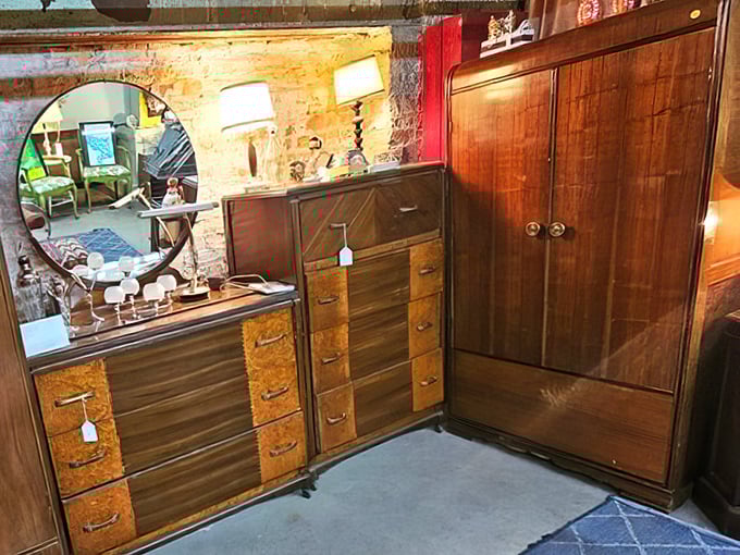 Mid-century furniture that whispers tales of martini parties and "I Love Lucy" marathons. That wardrobe definitely leads to vintage Narnia.