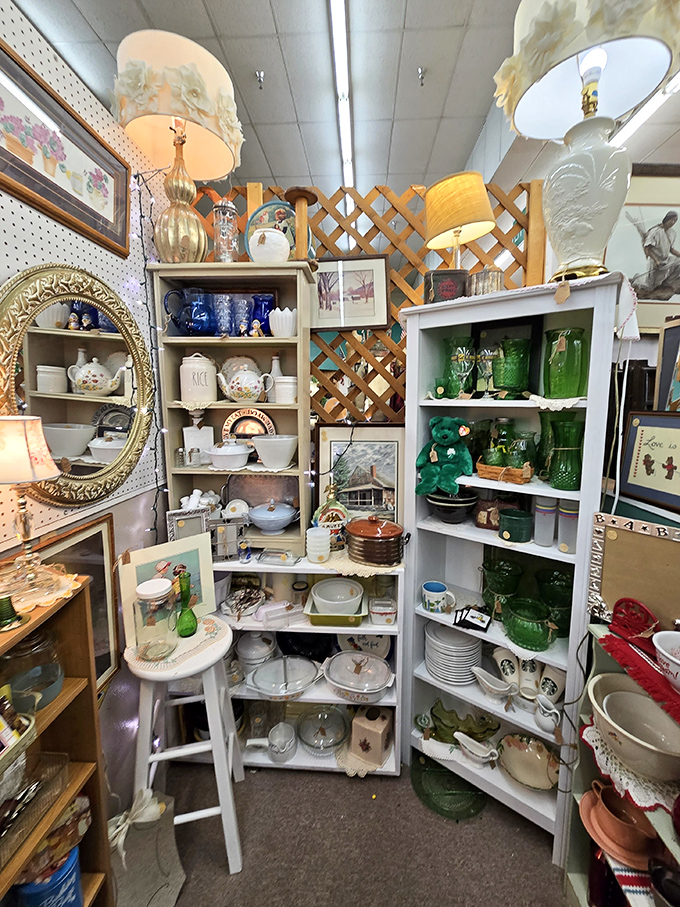 A collector's dream corner where vintage glassware creates a kaleidoscope of color&mdash;that jade green collection would make grandmother swoon!