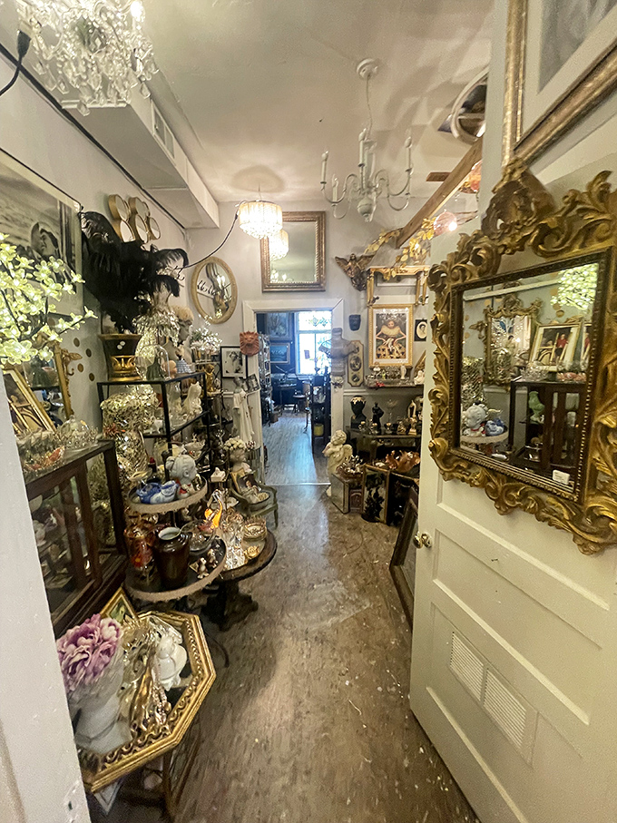 Step into this gleaming corridor of gilded mirrors and crystal chandeliers, where Hollywood Regency meets Southern elegance in dazzling harmony.