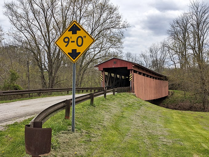 9 feet even warns the sign, a humble reminder that in the age of covered bridges, headroom was a luxury not everyone could afford.