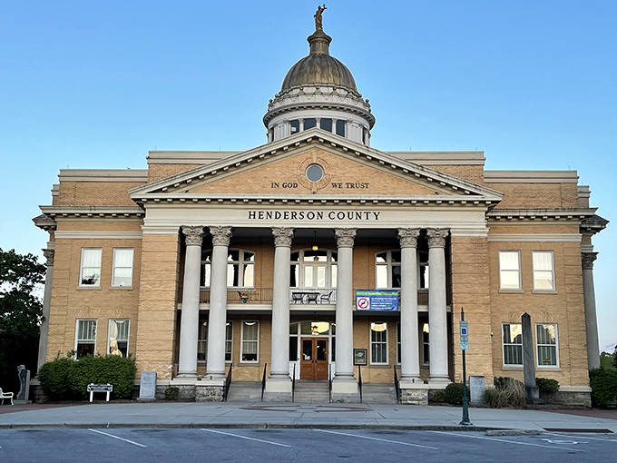 The Henderson County Courthouse stands as a stately sentinel, its classical architecture reminding visitors that some institutions age like fine wine.