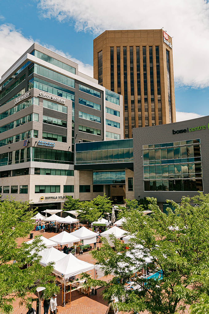 From this bird's-eye view, the white canopies resemble a village of culinary and artistic possibility nestled among Boise's urban landscape.