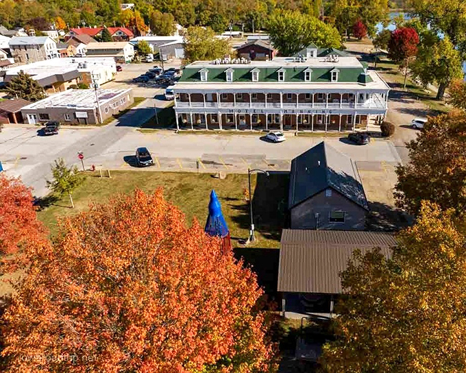 Aerial view of Hotel Manning &ndash; where "riverfront property" actually means something. Fall foliage provides nature's perfect backdrop to this historic landmark.